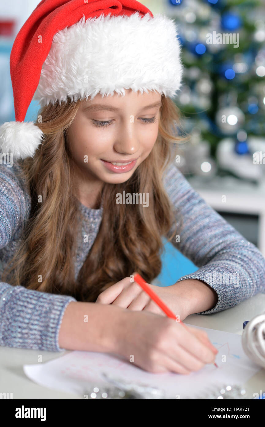 Teen girl writing letter Stock Photo - Alamy