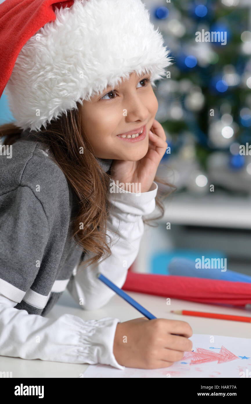 Girl writing letter Stock Photo - Alamy