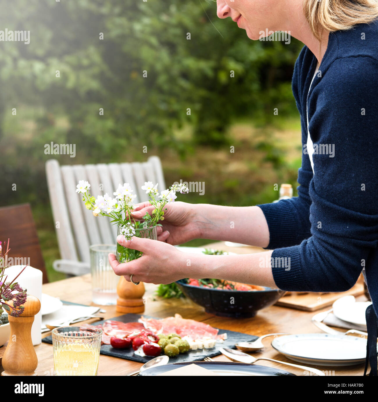 Woman Preparing Table Dinner Concept Stock Photo - Alamy