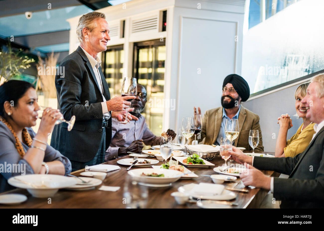 Business People Dining Together Concept Stock Photo - Alamy