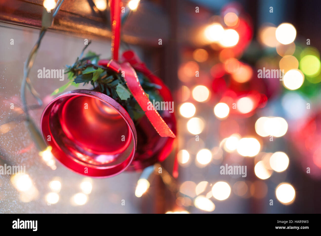 Christmas bells red on window Stock Photo - Alamy