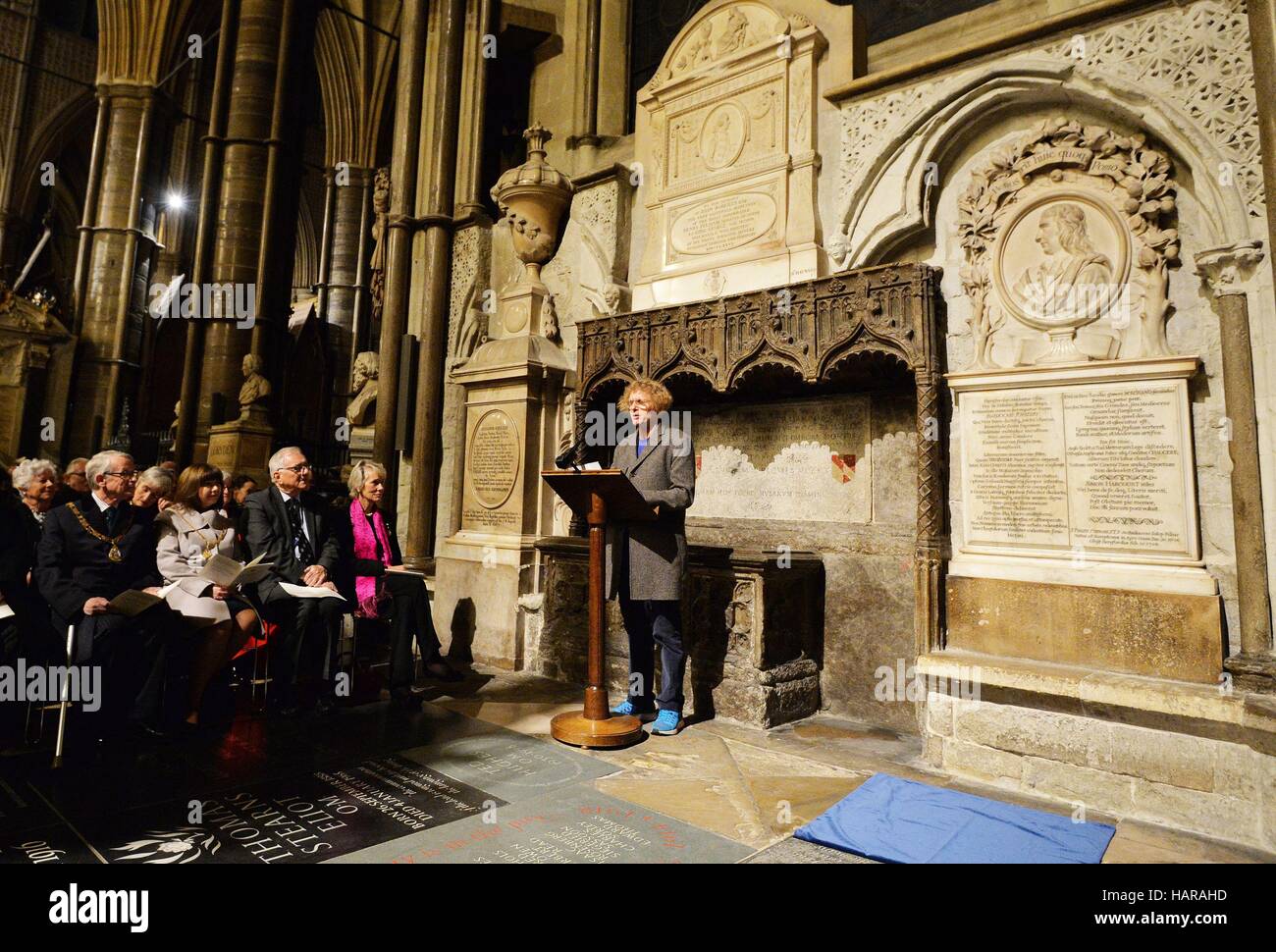 Grayson Perry reads a poem close to the memorial stone to poet Philip ...
