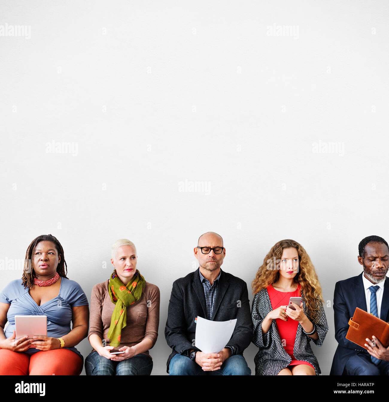 Diverse Group of People Community Sitting Waiting Concept Stock Photo ...