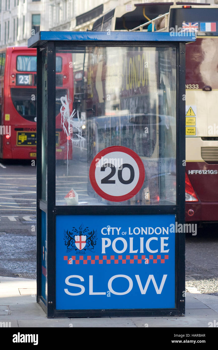 City of London police box with a notice warning motorists to slow down ...