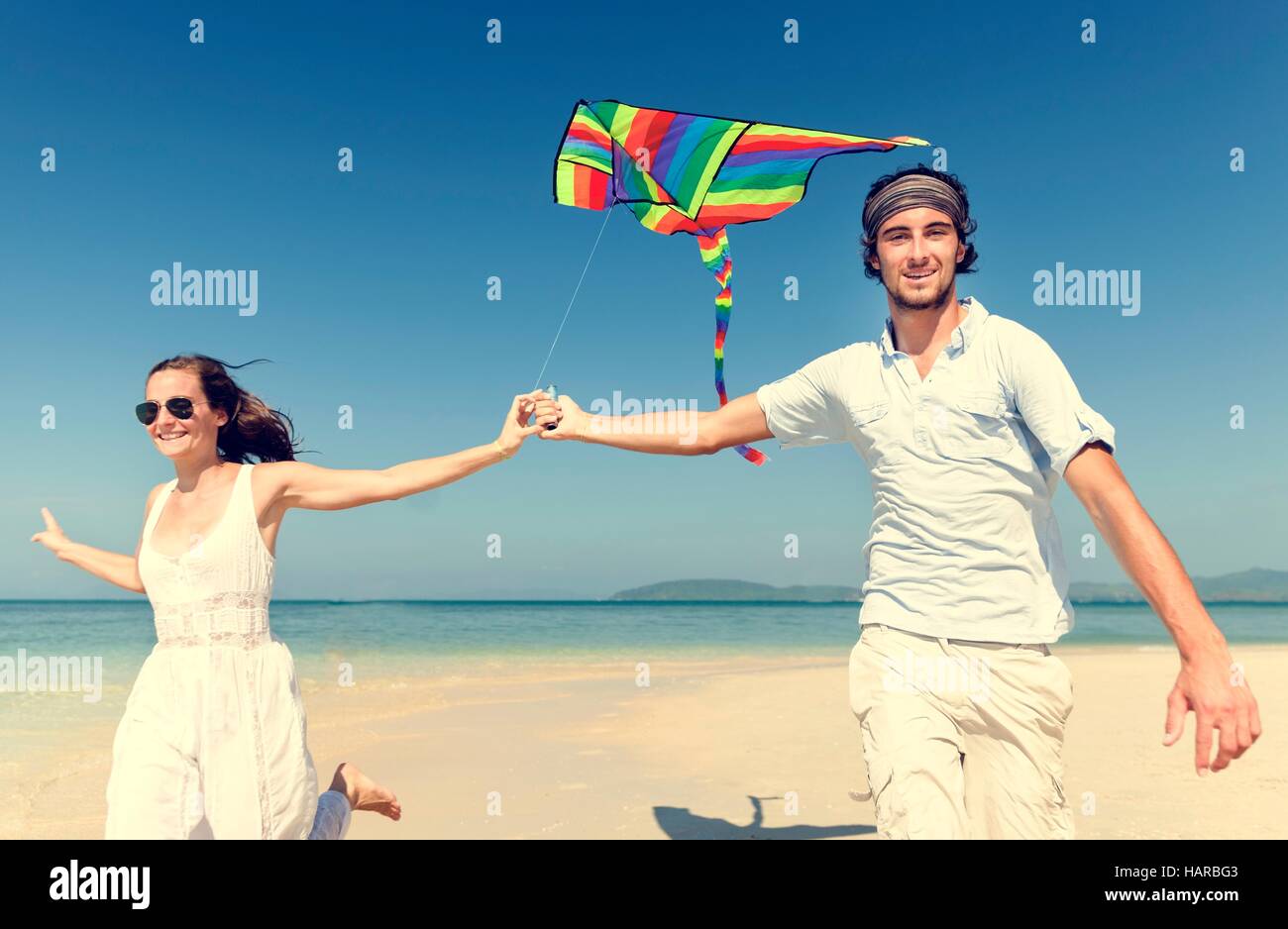 Beach Kite Couple Cheerful Vacation Tropical Concept Stock Photo - Alamy