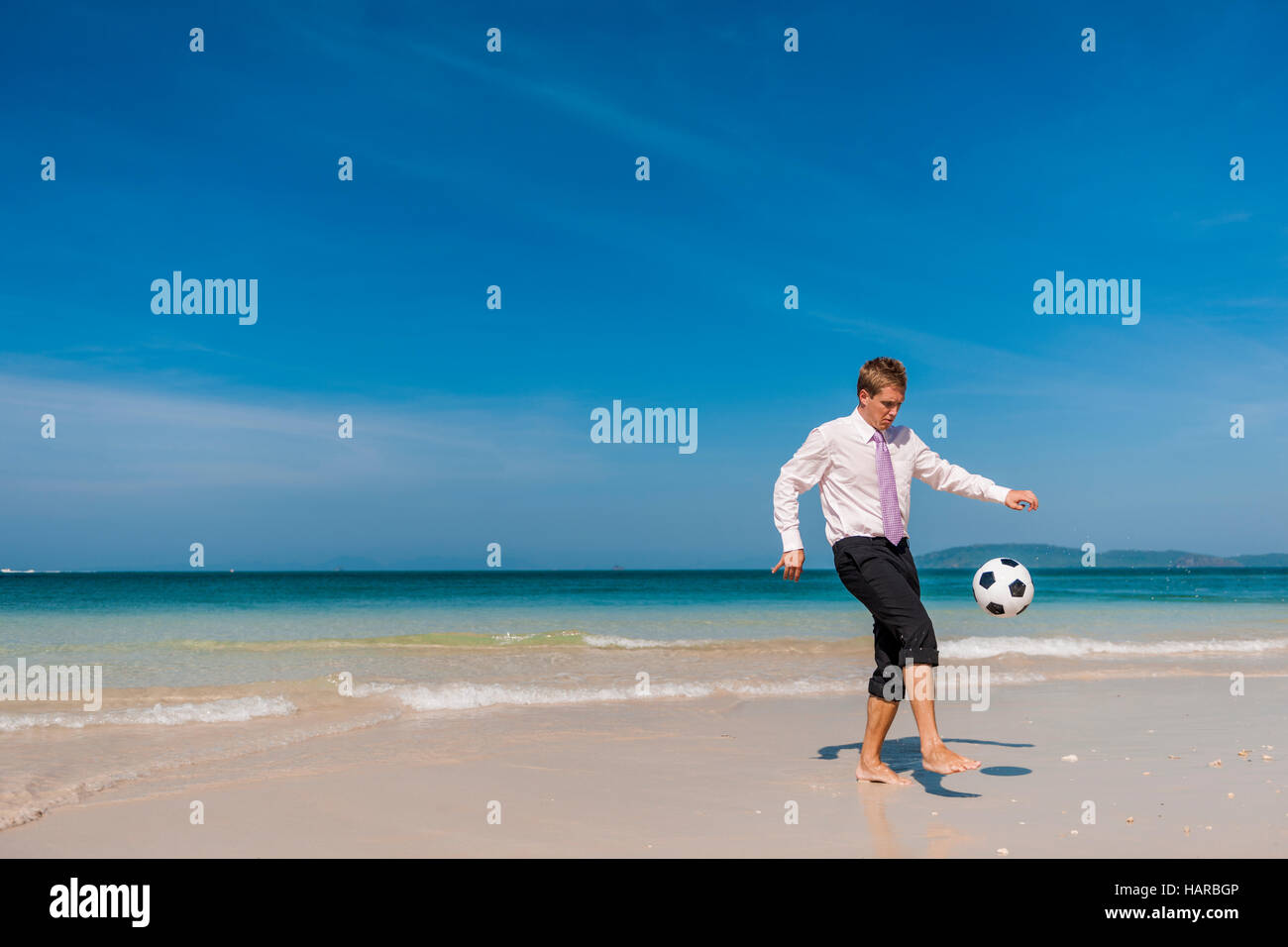 Businessman Travel Beach Football Relaxation Concept Stock Photo - Alamy