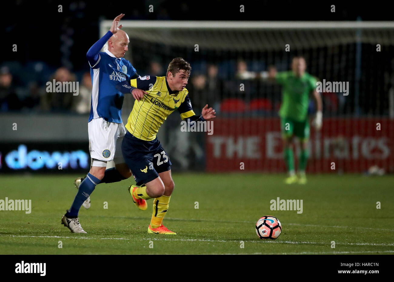 Macclesfield Town's Danny Whitaker (left) and Oxford United's Ryan ...