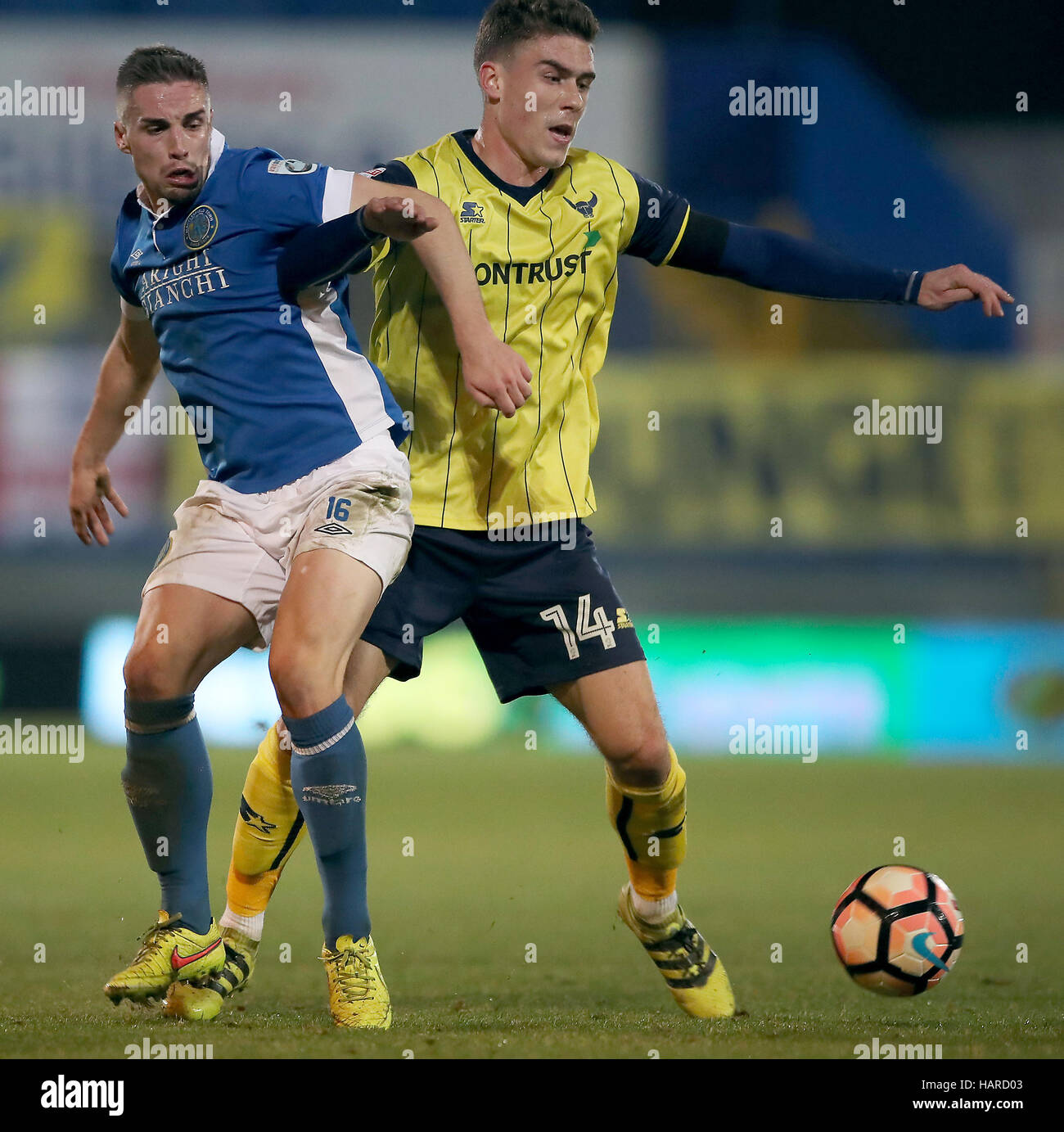 Macclesfield Town's Mitch Hancox (left) and Oxford United's Joshua ...