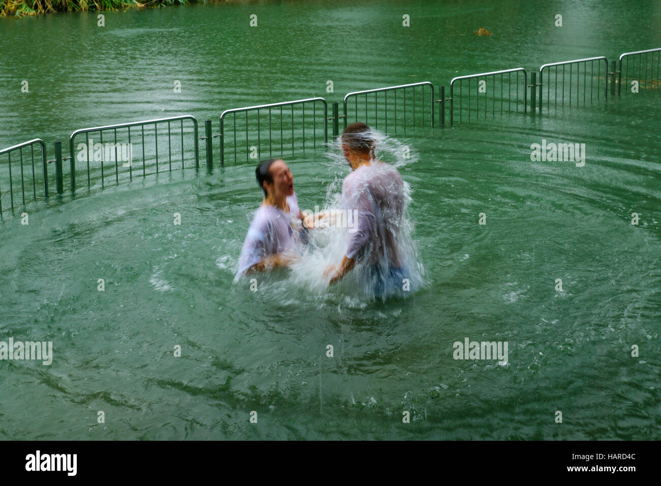 YARDENIT, ISRAEL - JANUARY 19, 2016: Pilgrims baptizing in the Jordan ...
