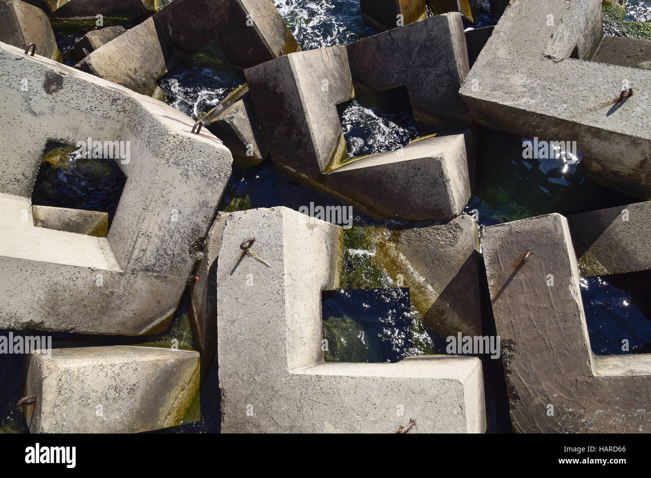 Breakwater blocks in the port. Breakwater of the rectangular stone ...