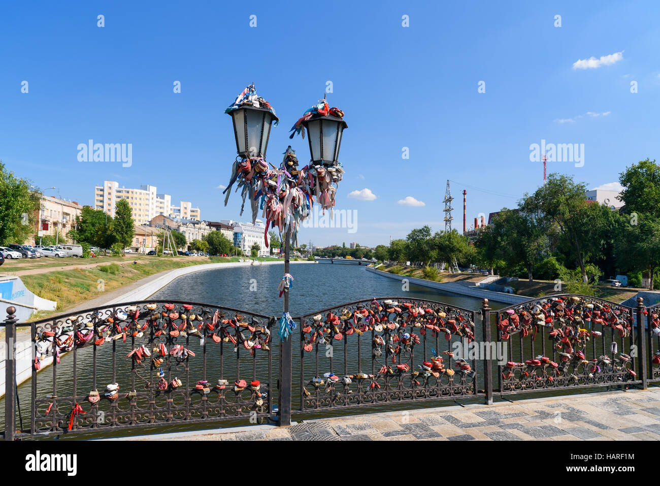 Love Bridge with a lot of colored ribbons and locks. Symbol of the ...