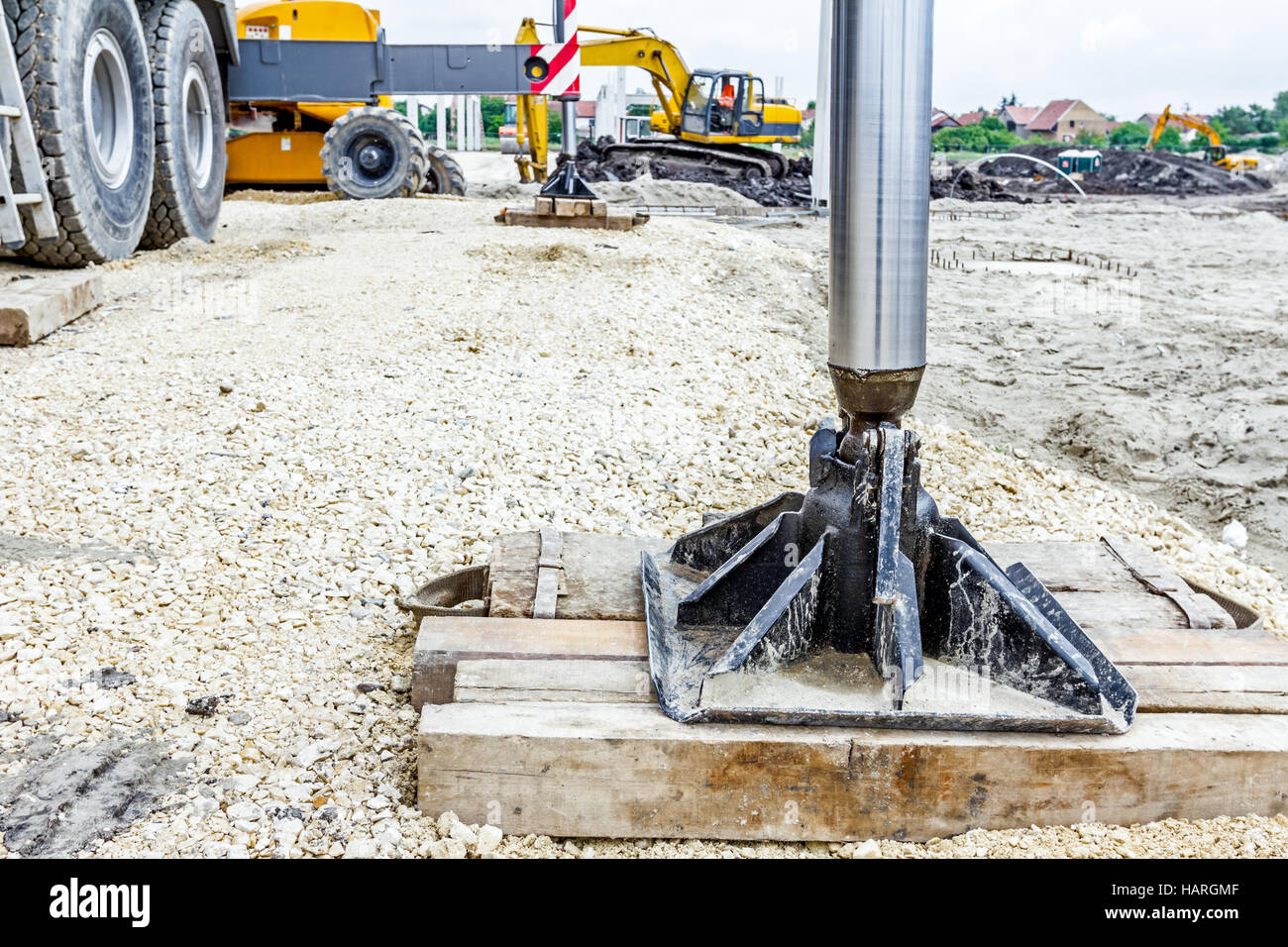 Extended side hydraulic outrigger to increase crane stability until is ...