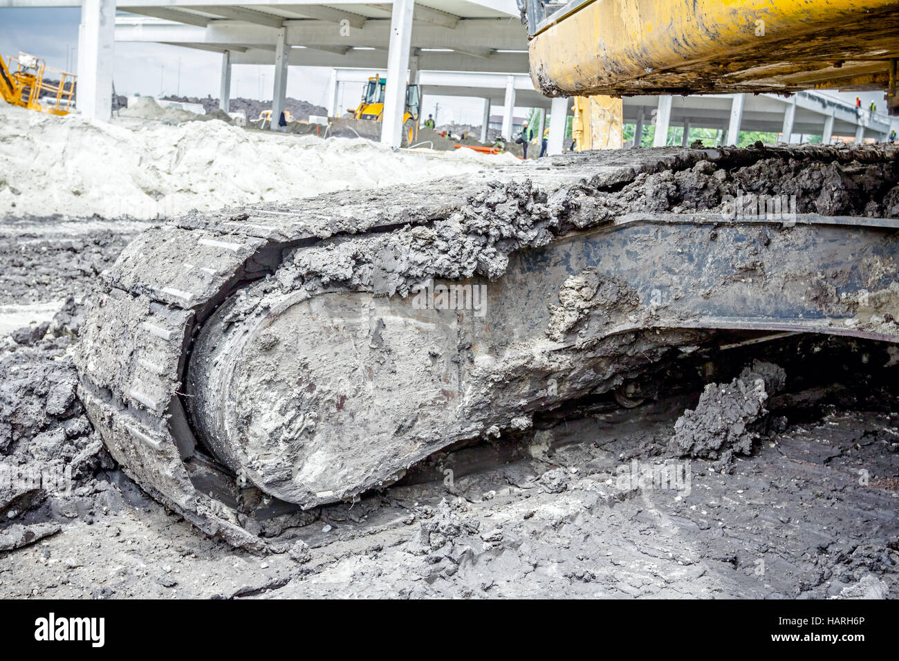 Close up view on dirty crawler during moving through mud on ...