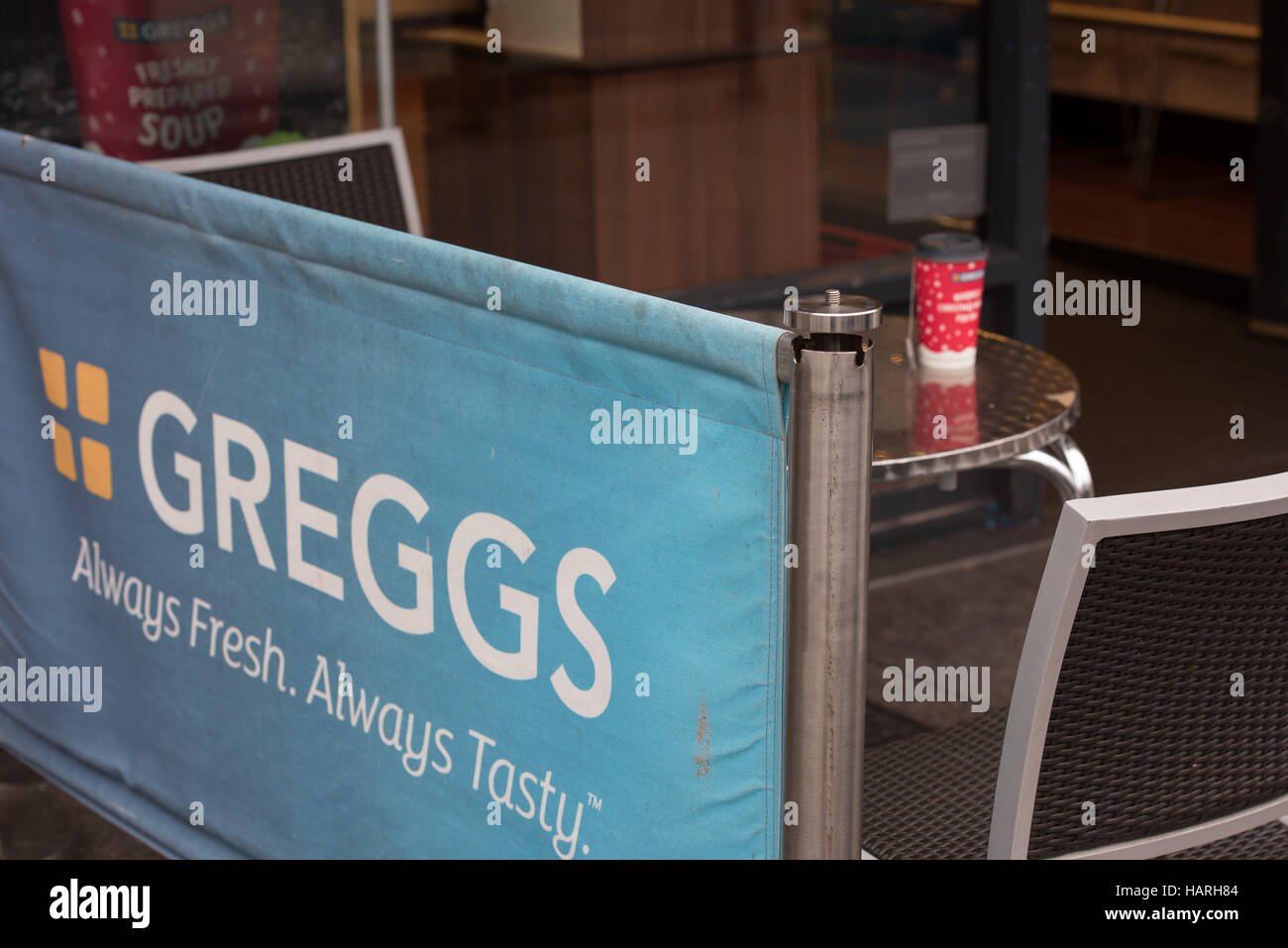 Greggs banner and table Stock Photo - Alamy