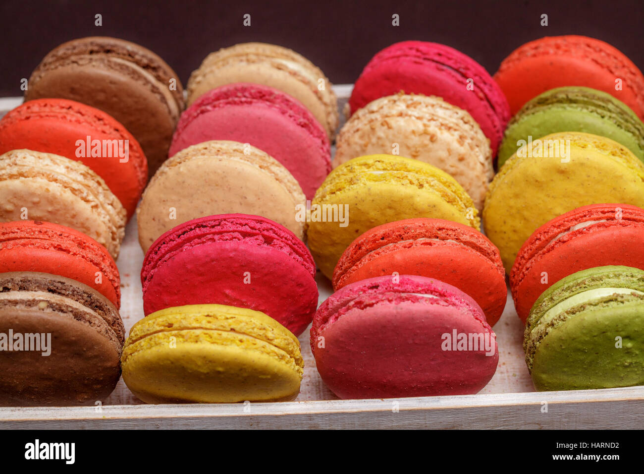 Many traditional french colorful macarons in a box, close-up Stock ...