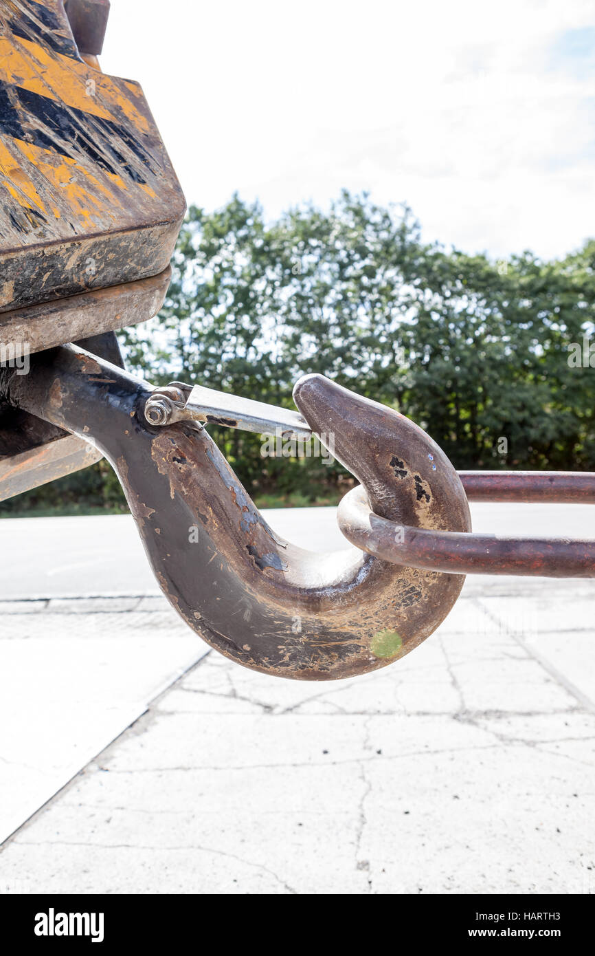 Lifting hook of a construction crane on the road Stock Photo - Alamy