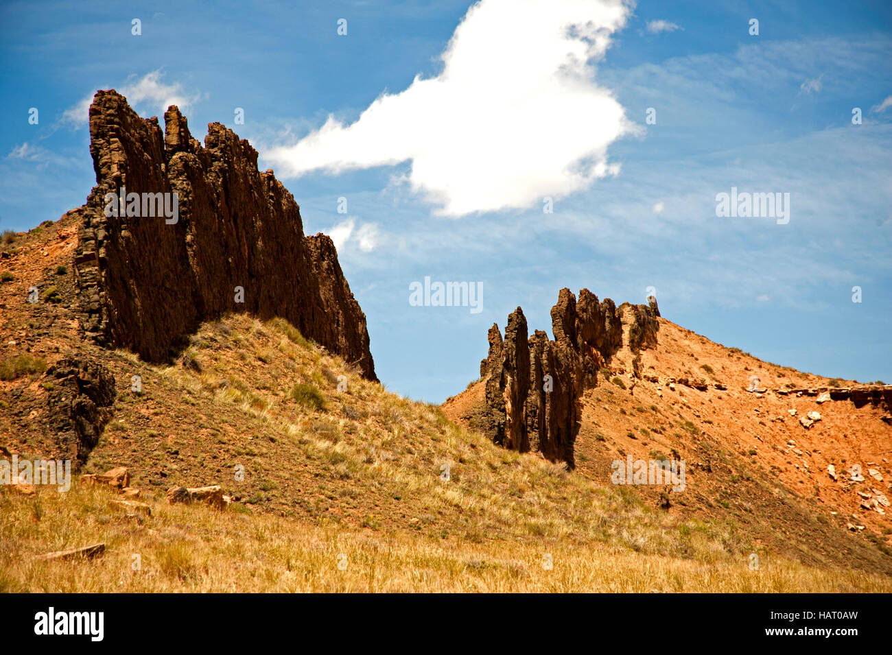 Dikes caused by erosion with sediment at the base of the dikes. Cloudy ...