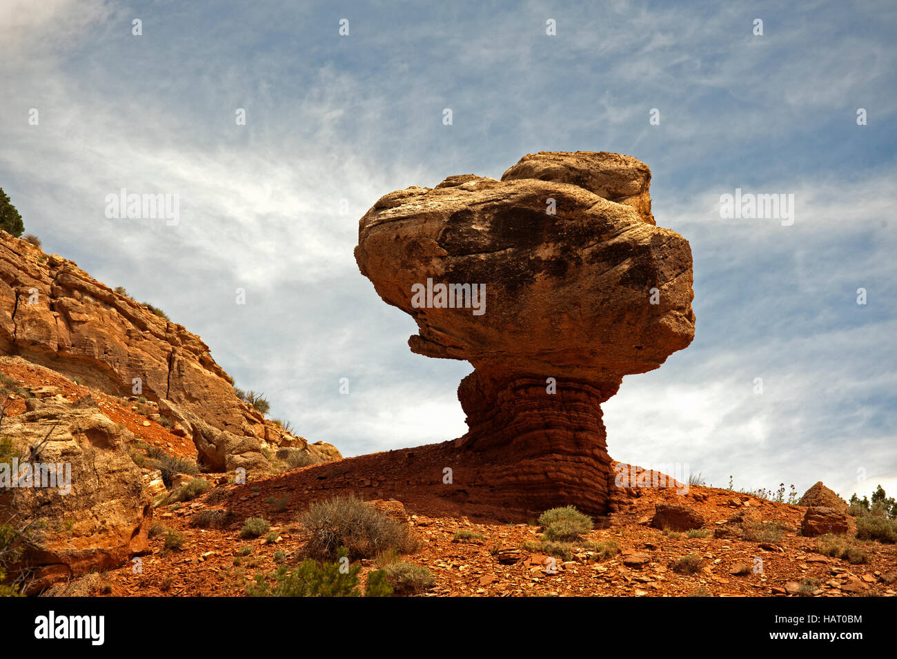 Balancing sandstone rock on sandstone pillar in Capital reef national ...
