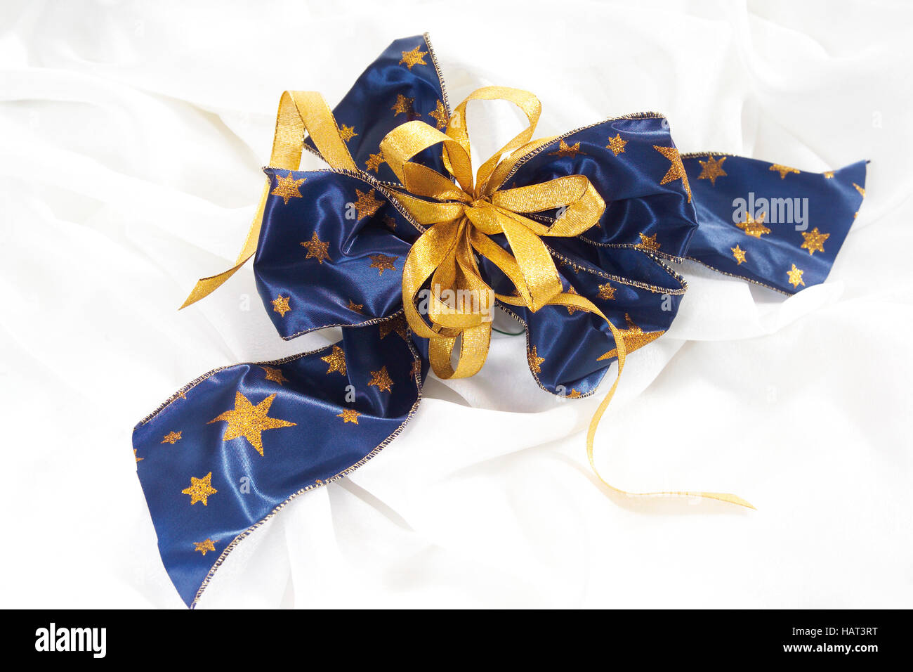 Blue ribbon and golden star Stock Photo - Alamy
