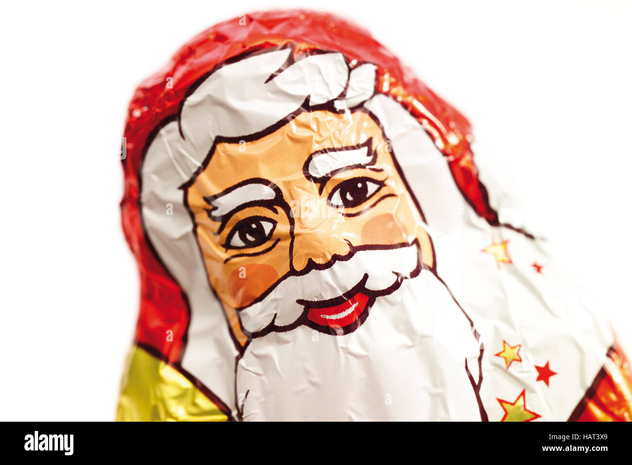 Chocolate Father Christmas wrapped in foil Stock Photo - Alamy