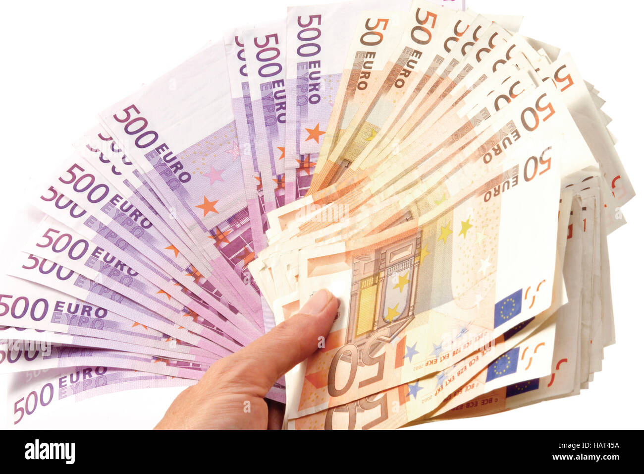 Hand holding Euro bank notes, arranged as a fan Stock Photo - Alamy