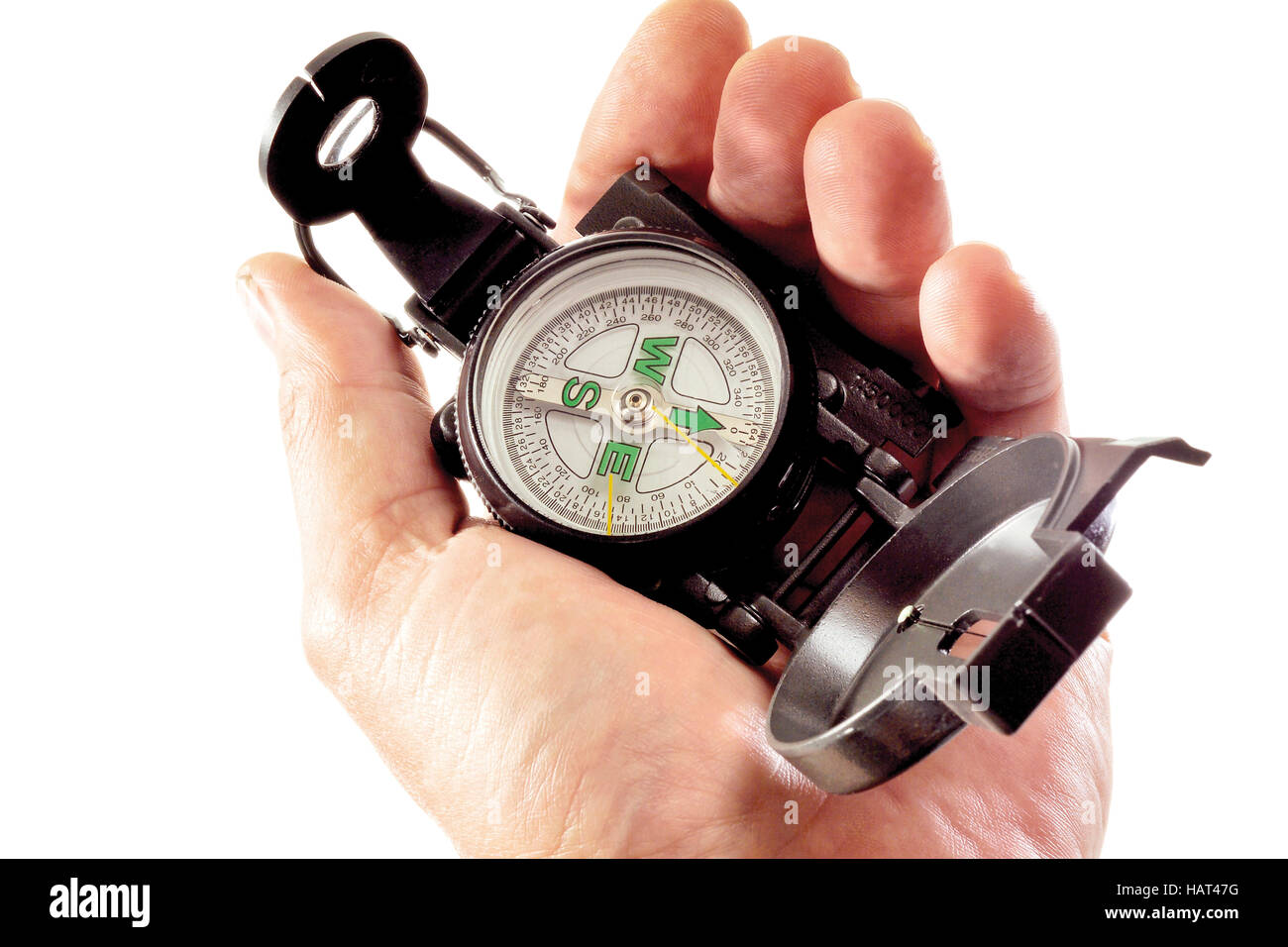 Hand holding a compass Stock Photo - Alamy