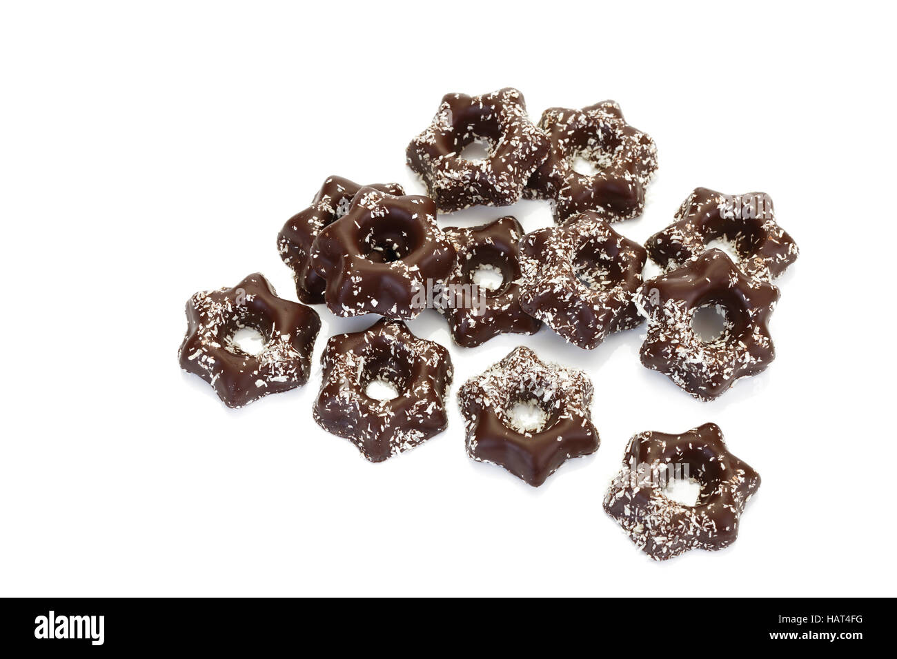 Coconut star candies coated in chocolate Stock Photo - Alamy