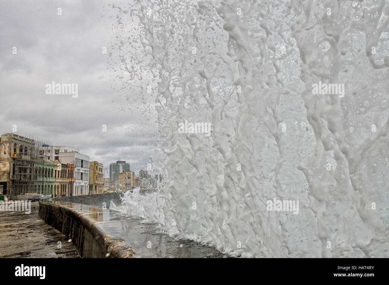 Wave jumping pier, rain and wind, Havana, Cuba Stock Photo - Alamy