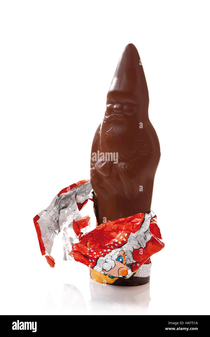 Chocolate Father Christmas with ripped open foil covering Stock Photo ...