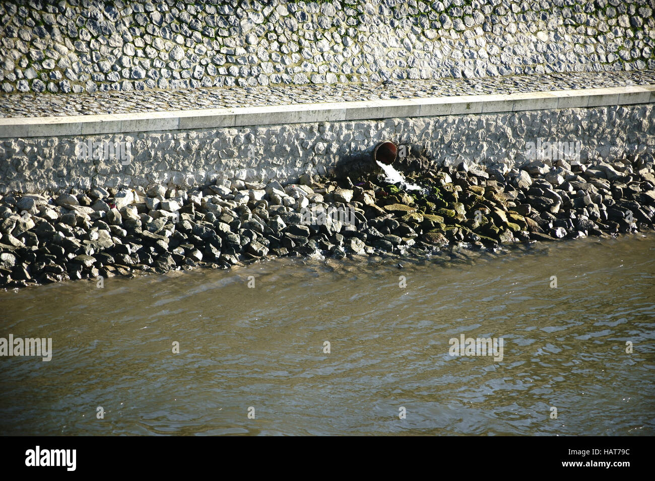 Discharge into the river Stock Photo - Alamy