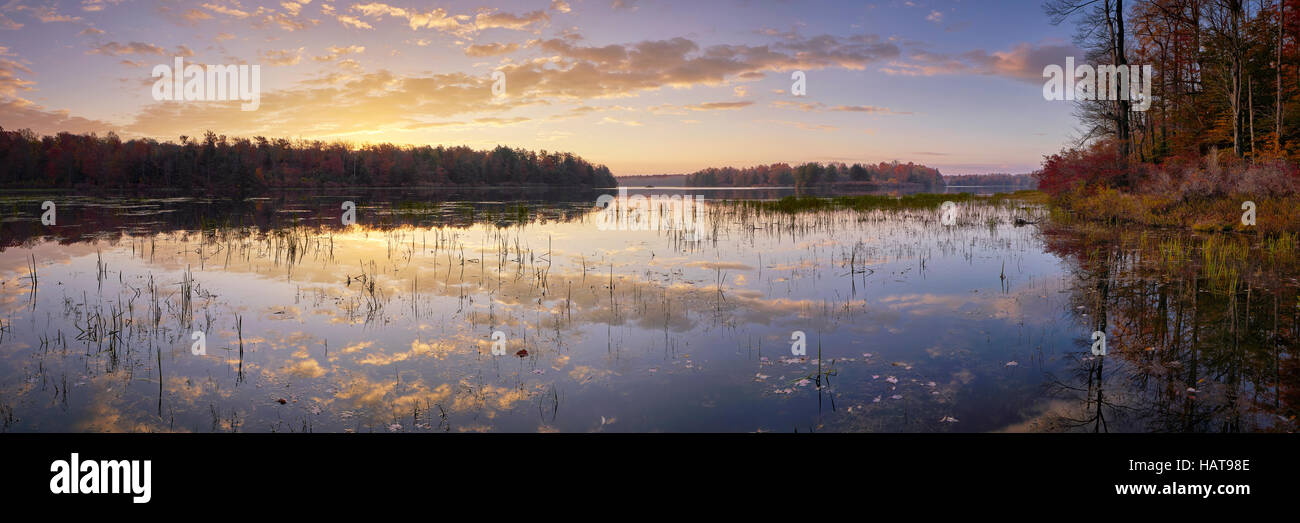 Autumn sunrise reflected in Lake Jean at Ricketts Glen State Park Stock ...