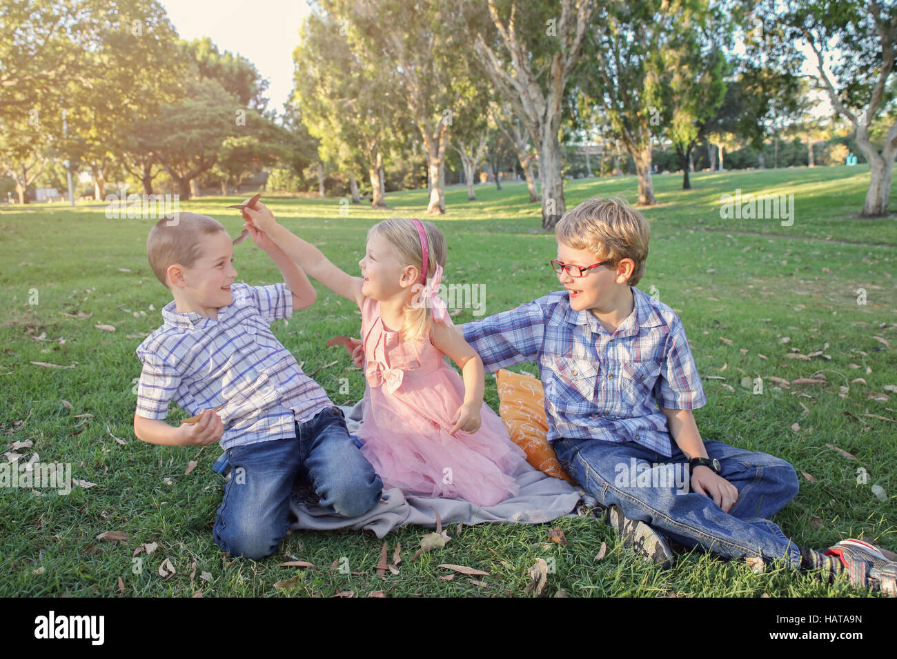 Brother sister playing park hi-res stock photography and images - Alamy