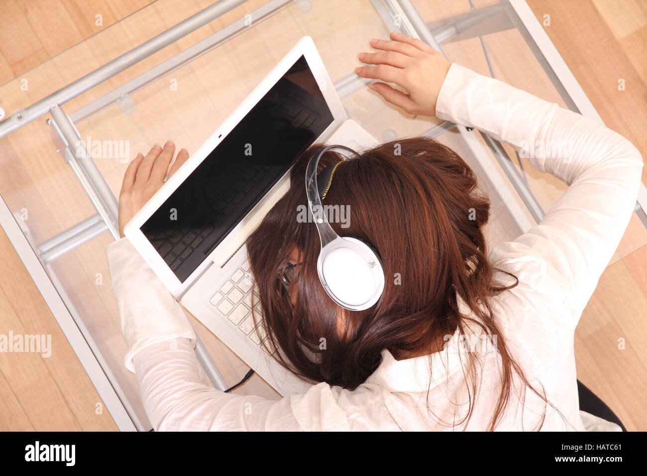 Sleeping on the Laptop Stock Photo - Alamy