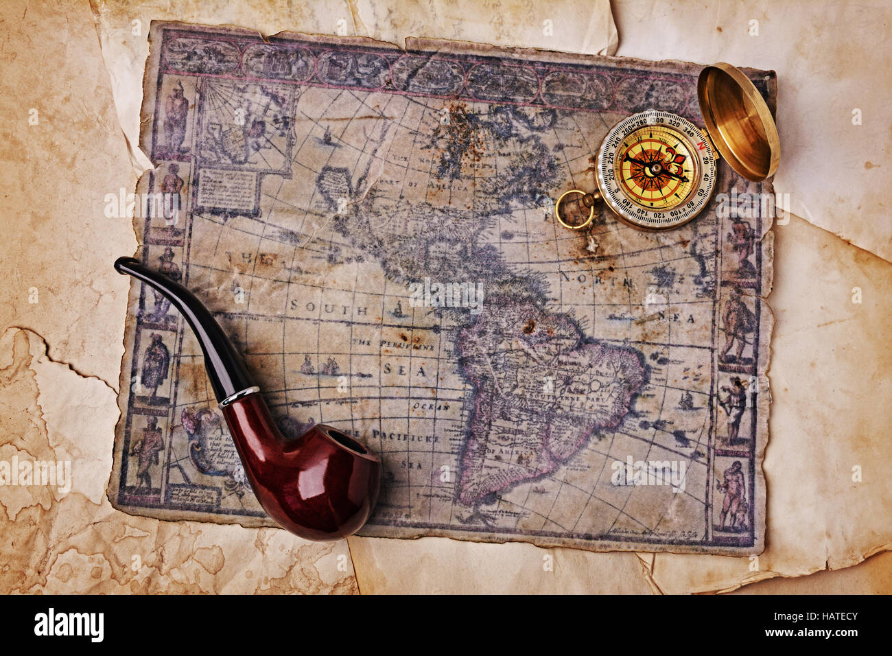Nautical background with ancient map, smoking pipe and compass Stock ...