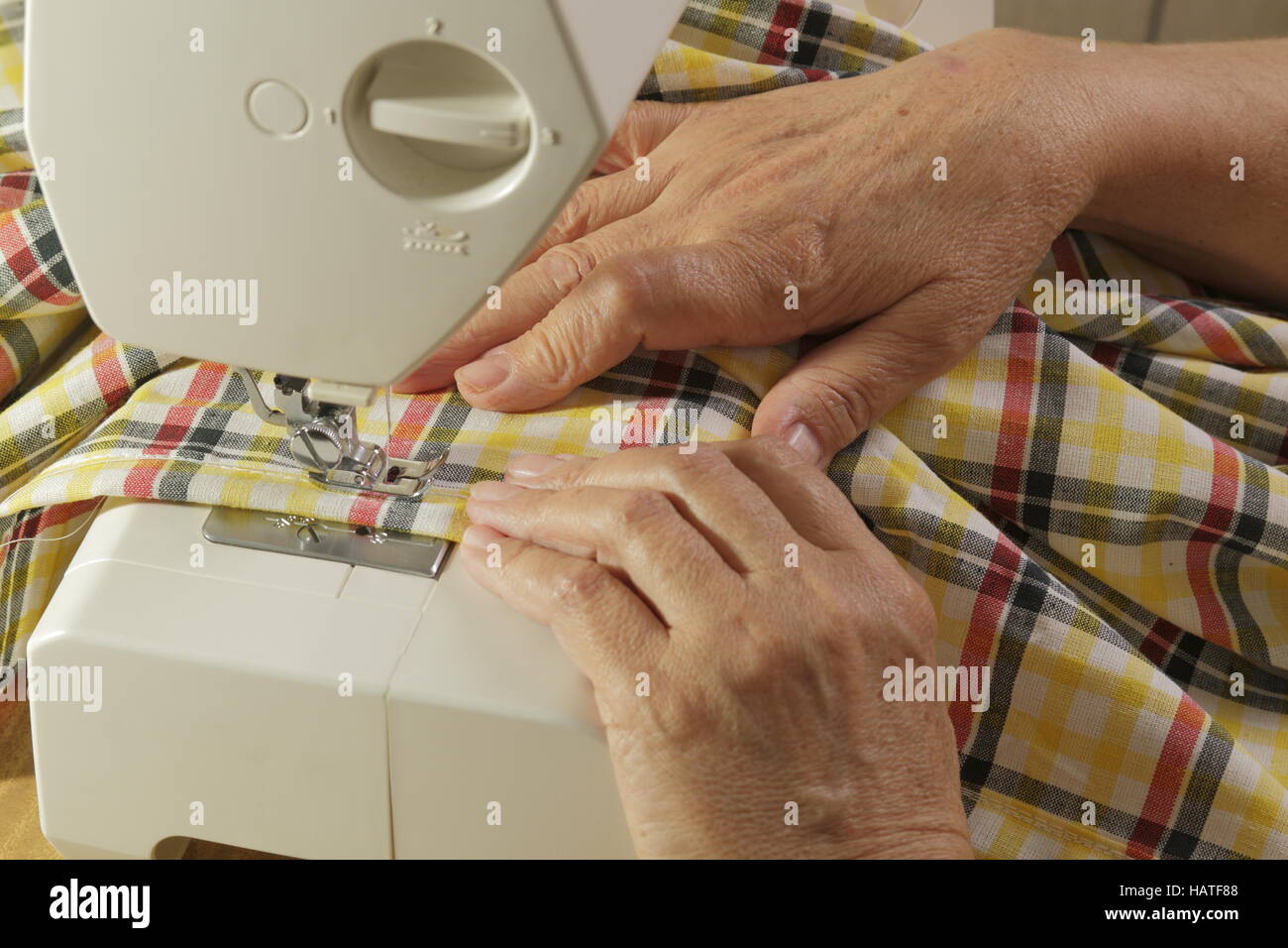 Woman working sewing machine close hi-res stock photography and images ...