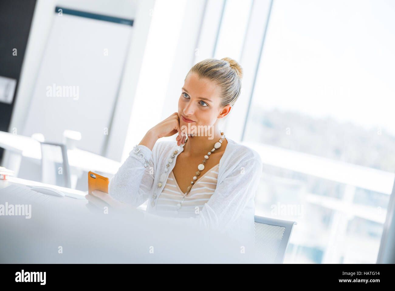 Elegant office worker Stock Photo - Alamy