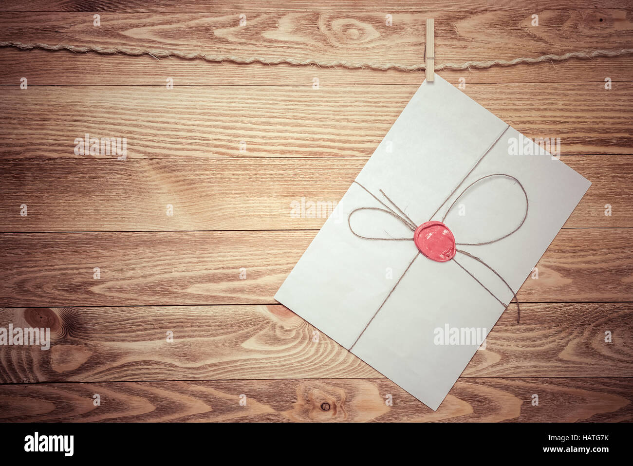 Mail envelope on rope Stock Photo - Alamy