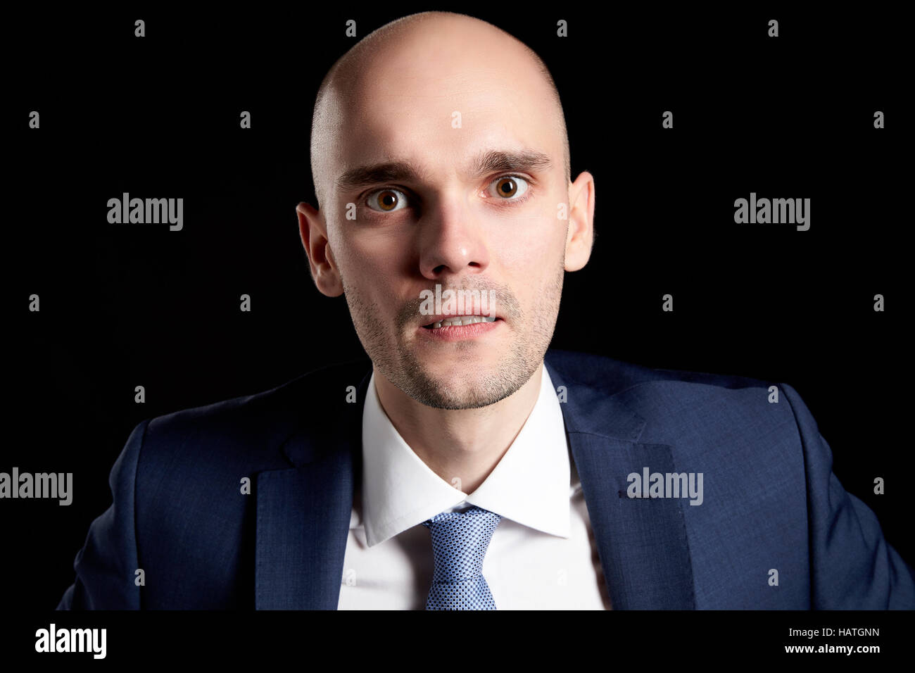 Portrait of Young Angry Guy against Black Background Stock Photo - Alamy