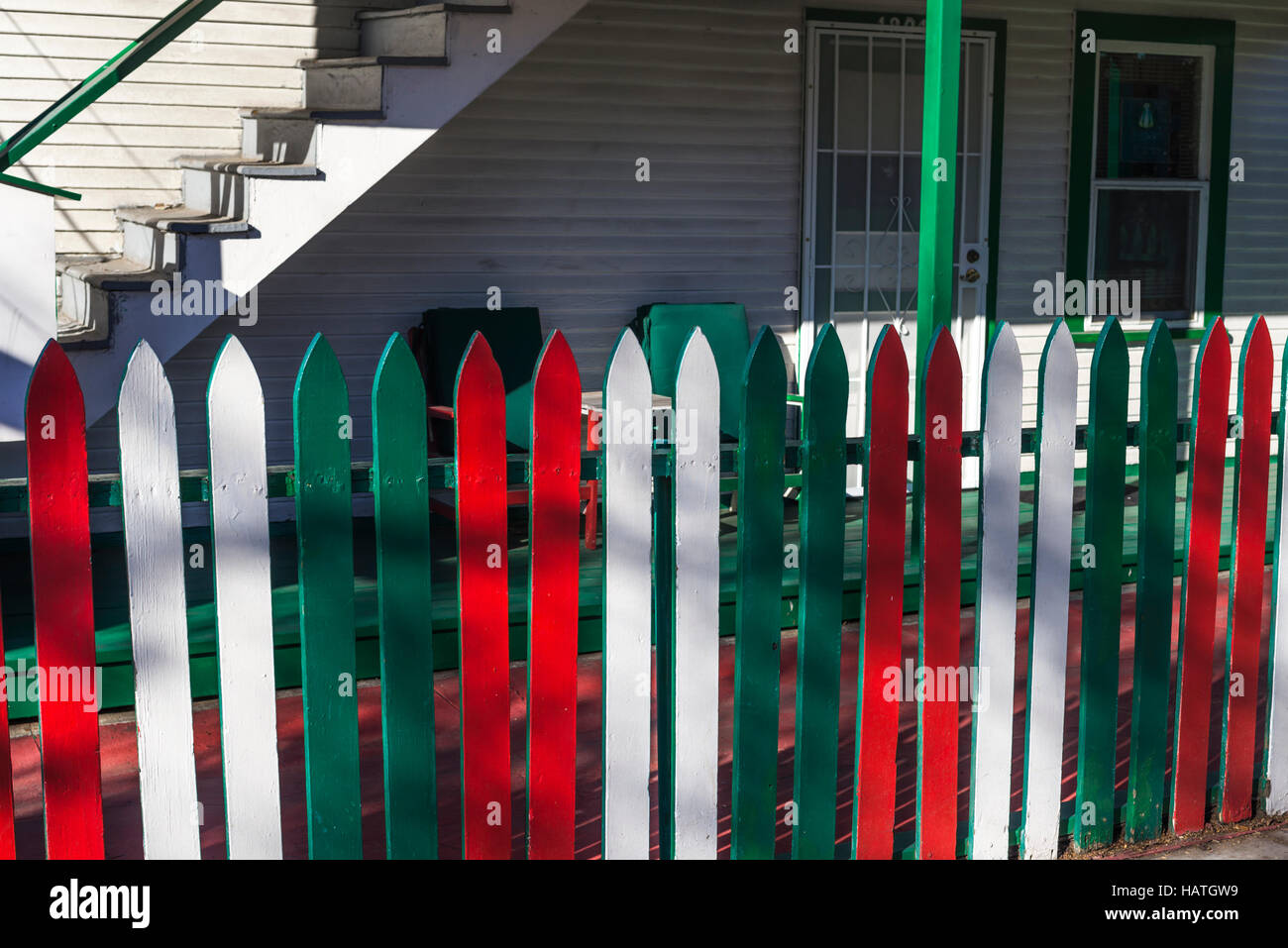 House with wooden fences painted in the colors of the Italian Flag ...