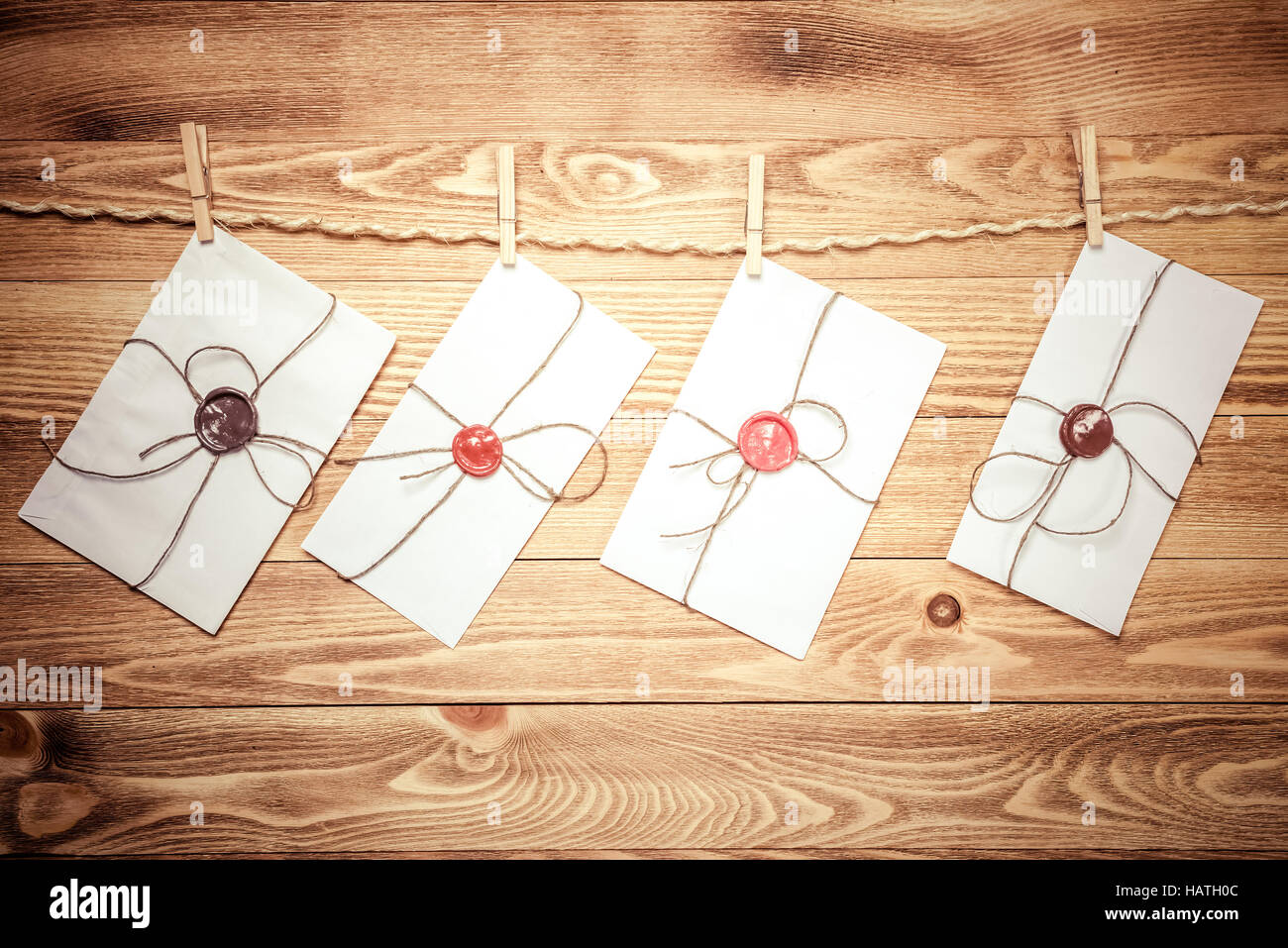 Mail envelope on rope Stock Photo - Alamy