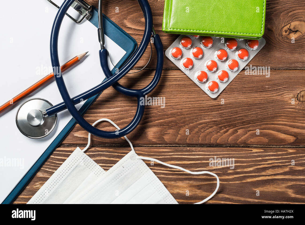 Desk of doctor with medicine things Stock Photo - Alamy