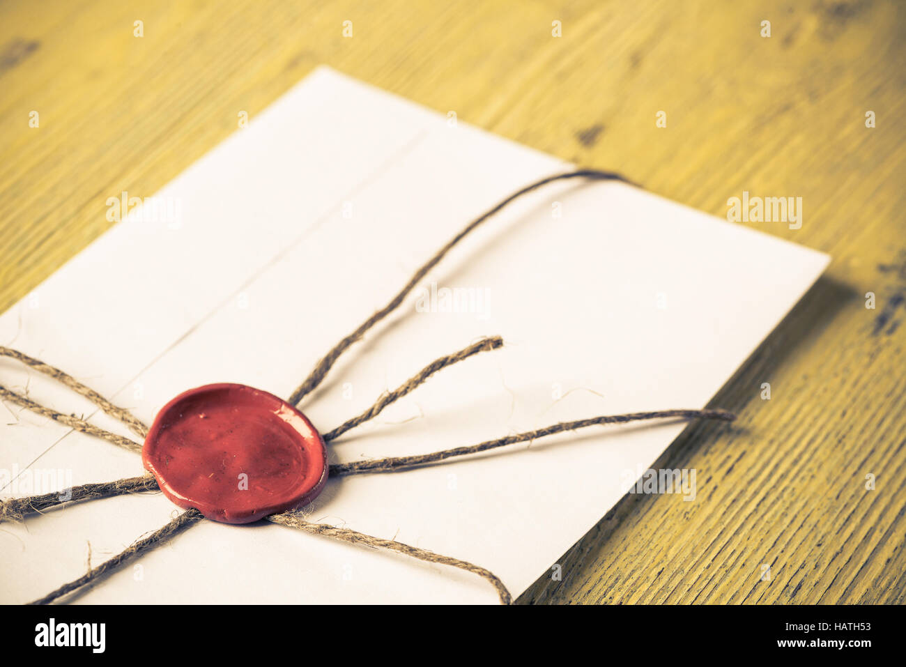 Letter with seal on table Stock Photo - Alamy