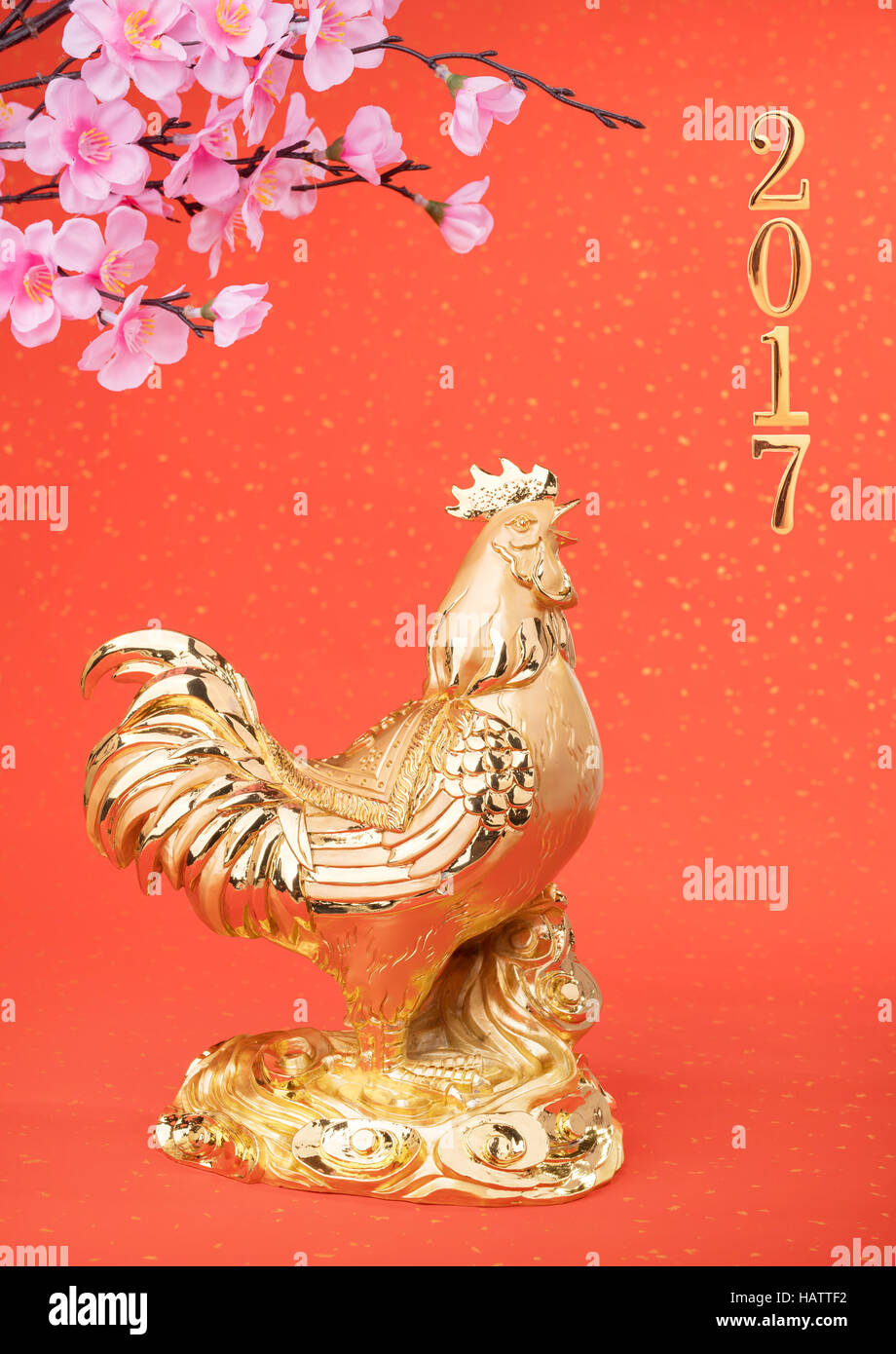 Rooster year,Gold Rooster with plum Stock Photo - Alamy