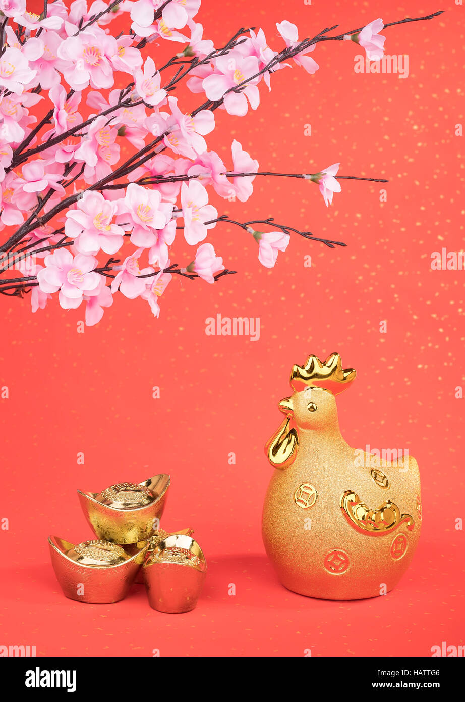 Rooster year,Gold Rooster with plum Stock Photo - Alamy