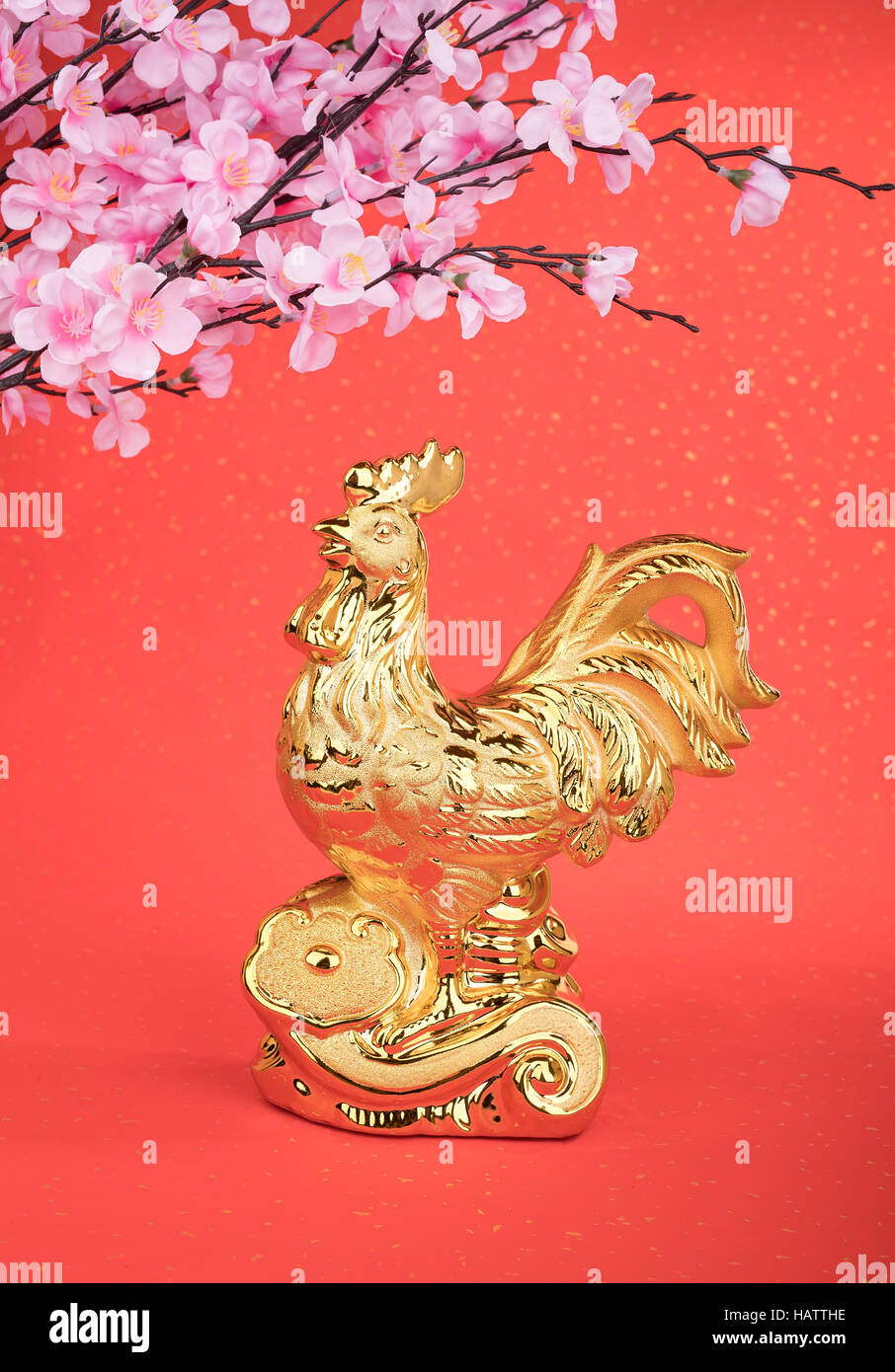 Rooster year,Gold Rooster with plum Stock Photo - Alamy