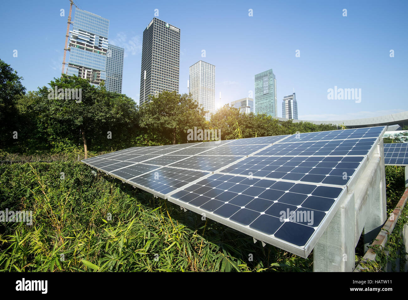 Solar Panels In The Park Of Modern City Stock Photo - Alamy