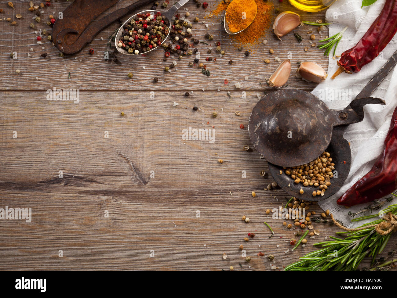 Various herbs and spices on dark wood table Stock Photo - Alamy