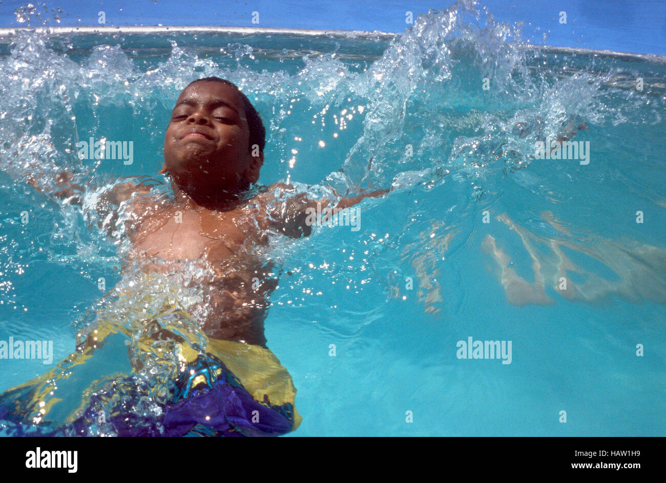 Boy and splash hi-res stock photography and images - Alamy