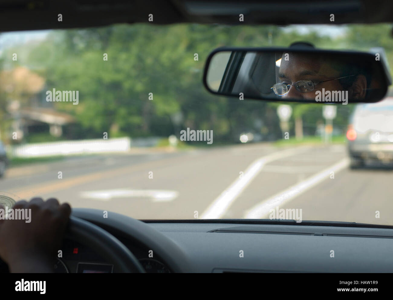 Teenager learning to drive Stock Photo - Alamy