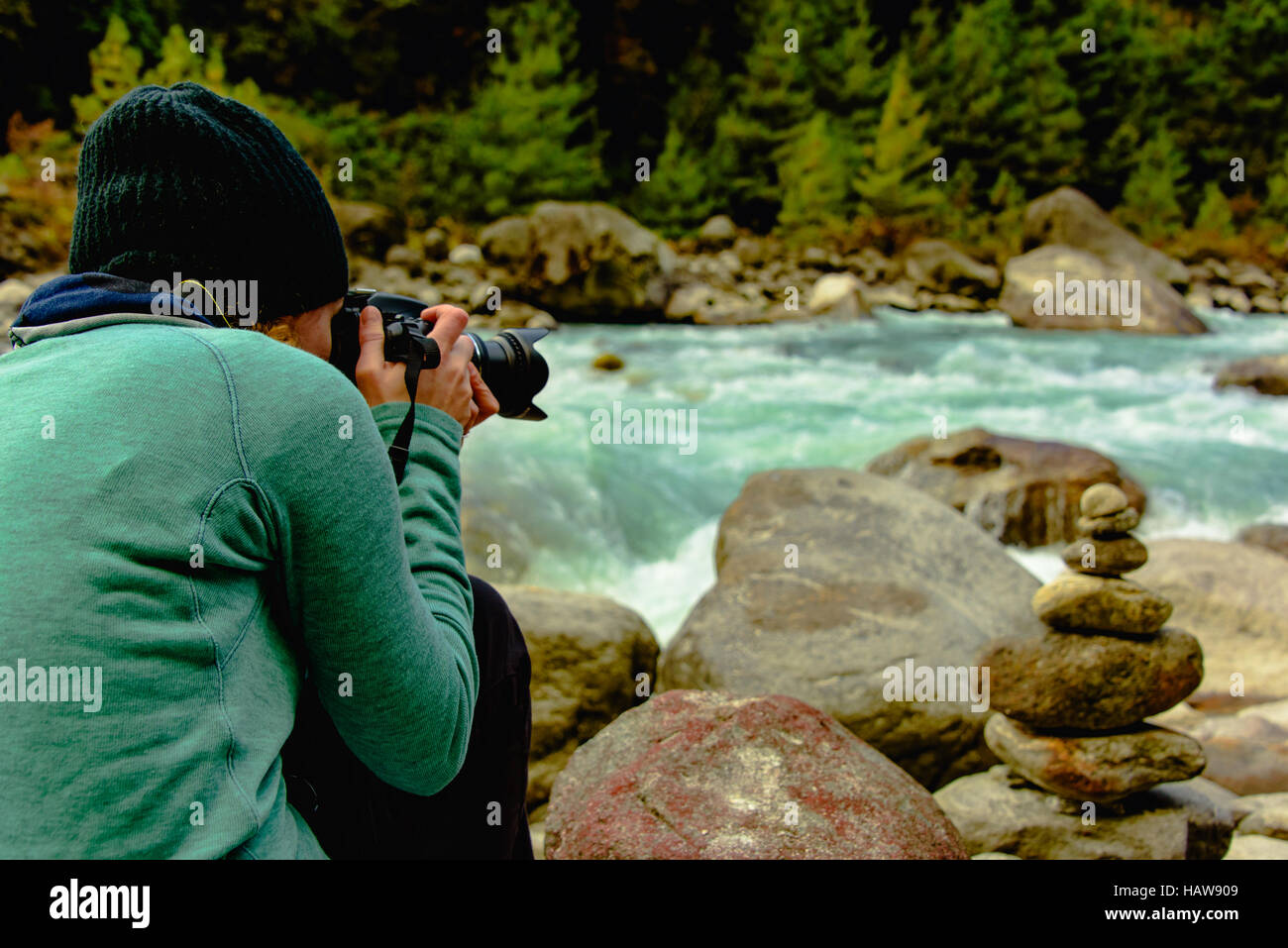 Woman walking on riverside in hi-res stock photography and images - Alamy